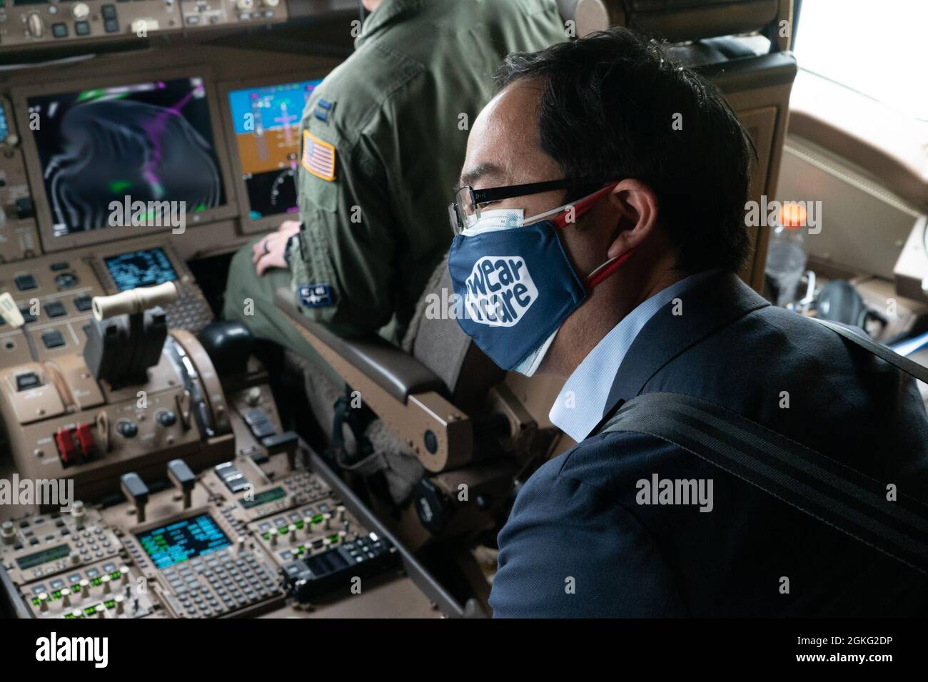 Rep. Andy Kim, D-N.J., sits on the flight deck of a KC-46A Pegasus ...