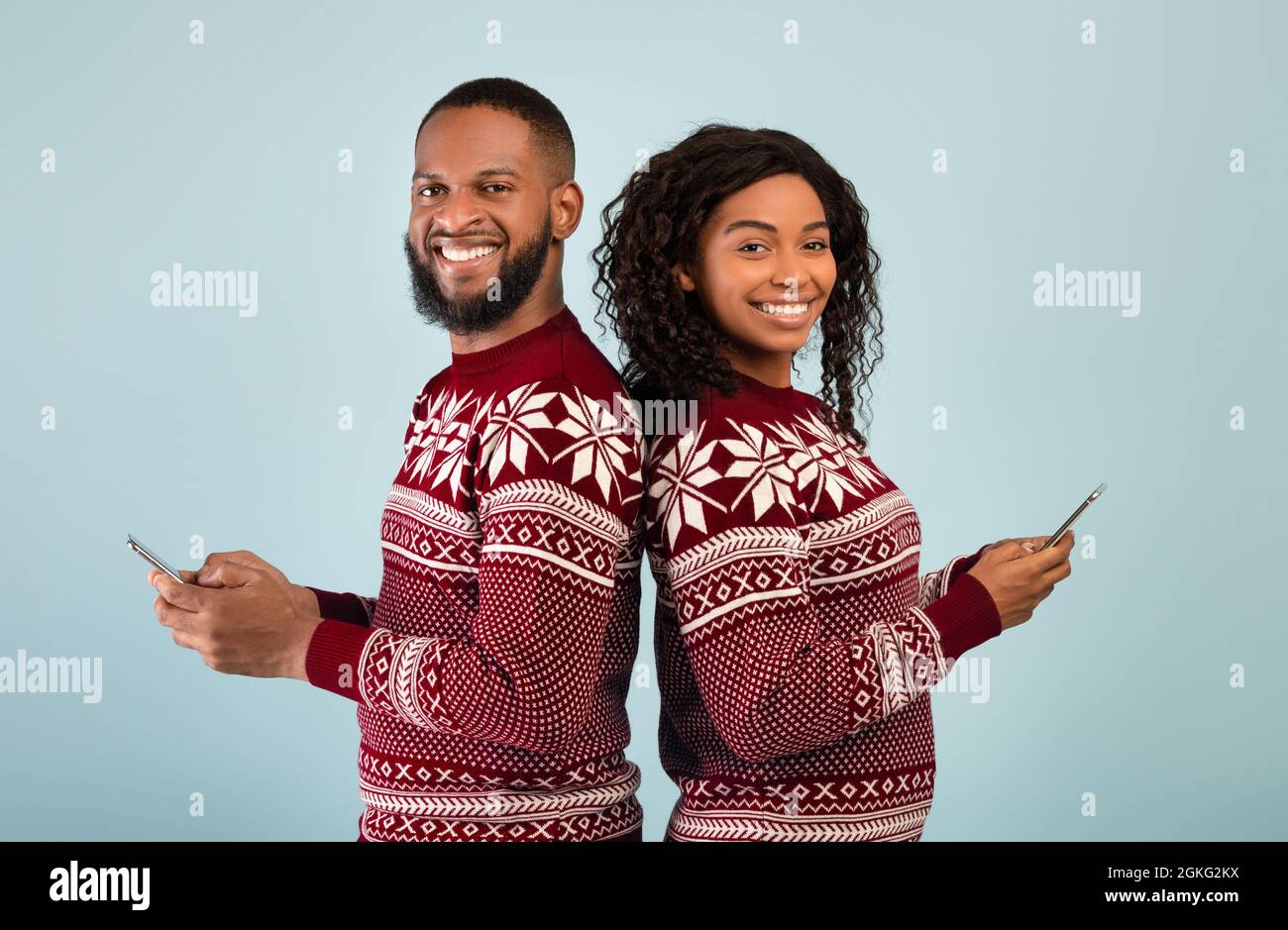 New Year and Xmas promotions. Happy african american man and woman ...