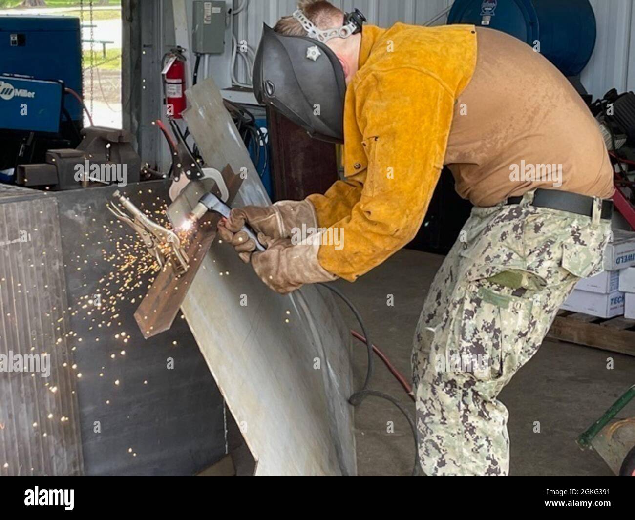 200413-N-SK929-1001 SANTA RITA, Guam (Apr. 13, 2021) A Seabee assigned ...