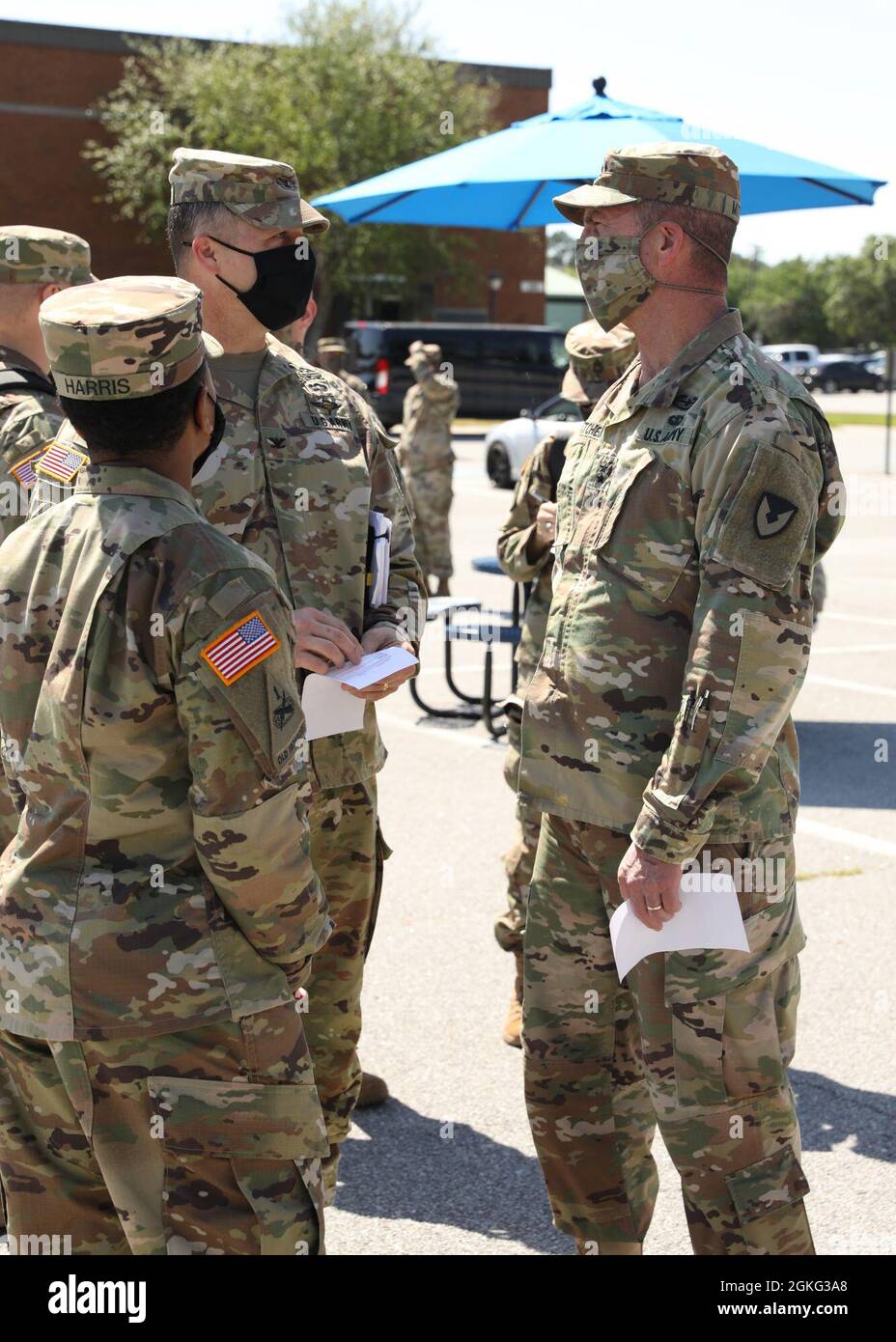 Maj. Gen. Daniel Mitchell (right), the commanding general of Army ...