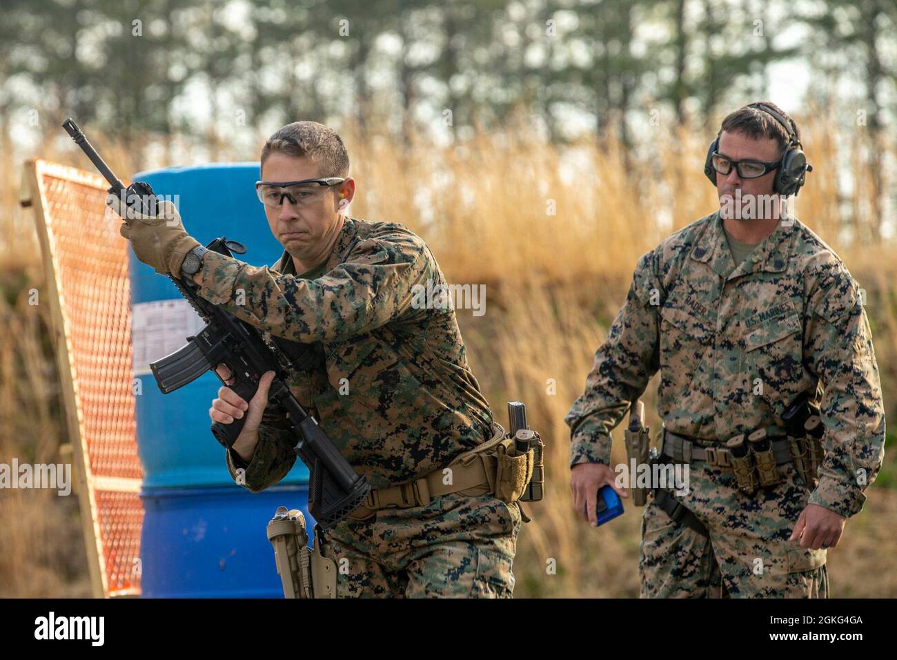 U.S. Marine Lance Cpl. Taylor Brown, left, assigned to Marine Corps ...