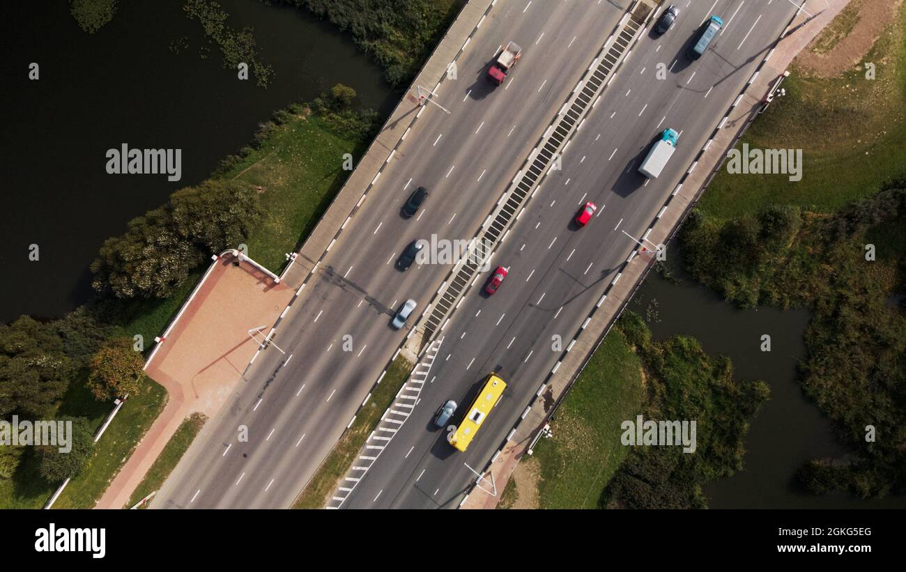 An overpass across the city river. Busy freeway. Aerial photography ...