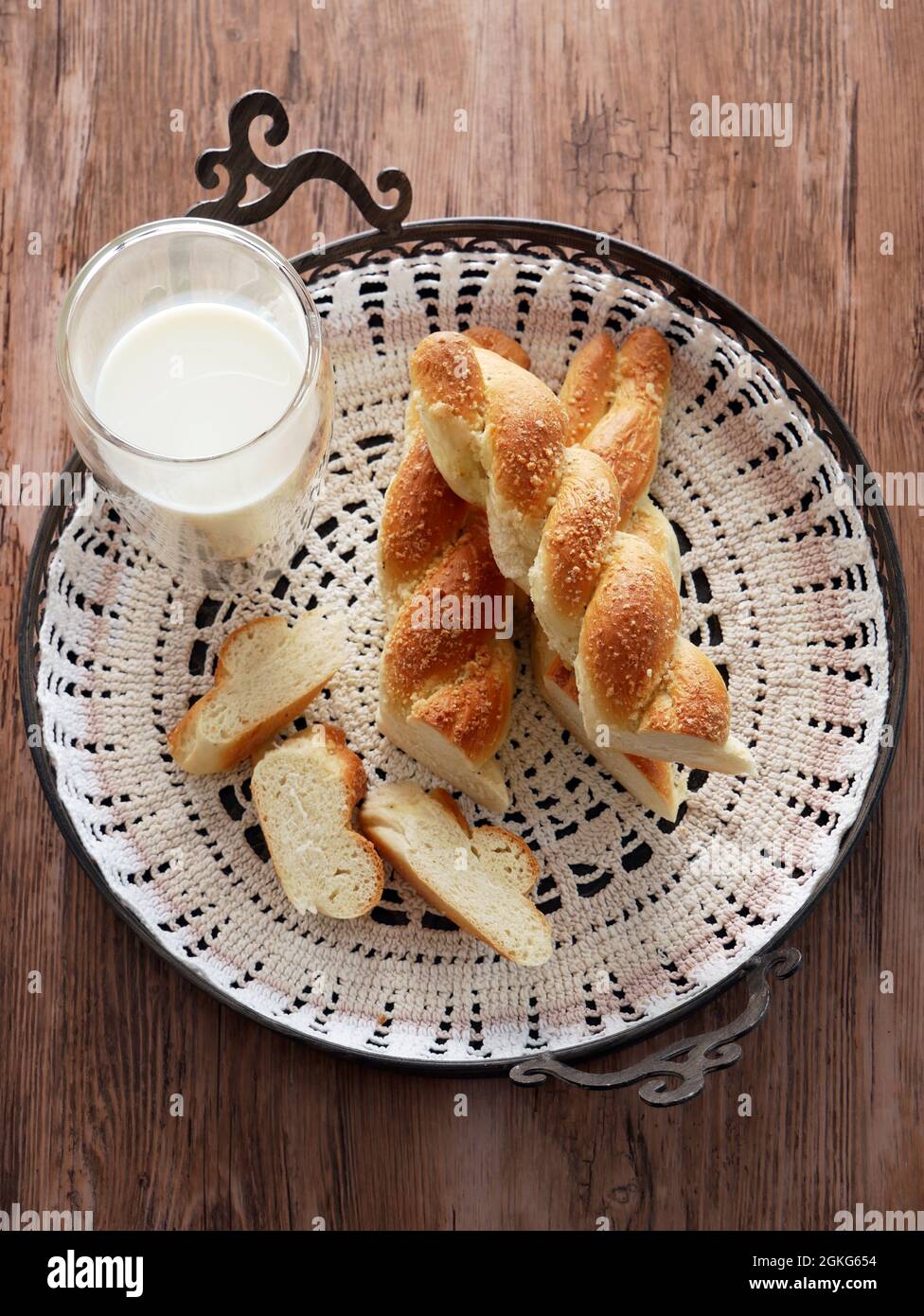 Home made mini challah and fresh milk. Simple rustic breakfast Stock ...