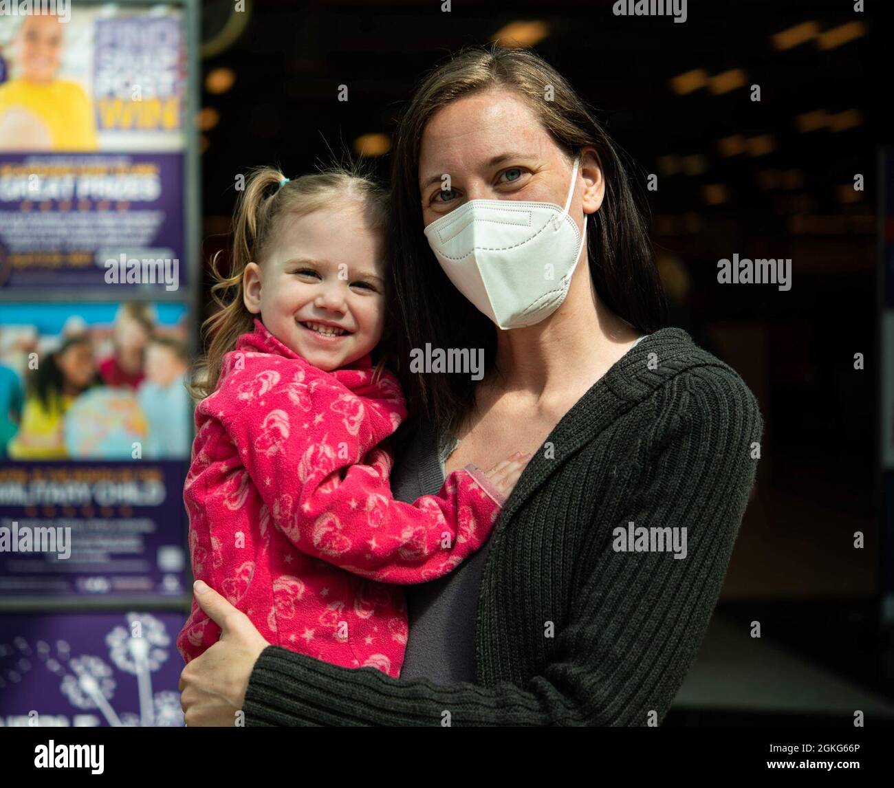 Lindsey Parker holds her child, Emmary, at the Base Exchange at ...