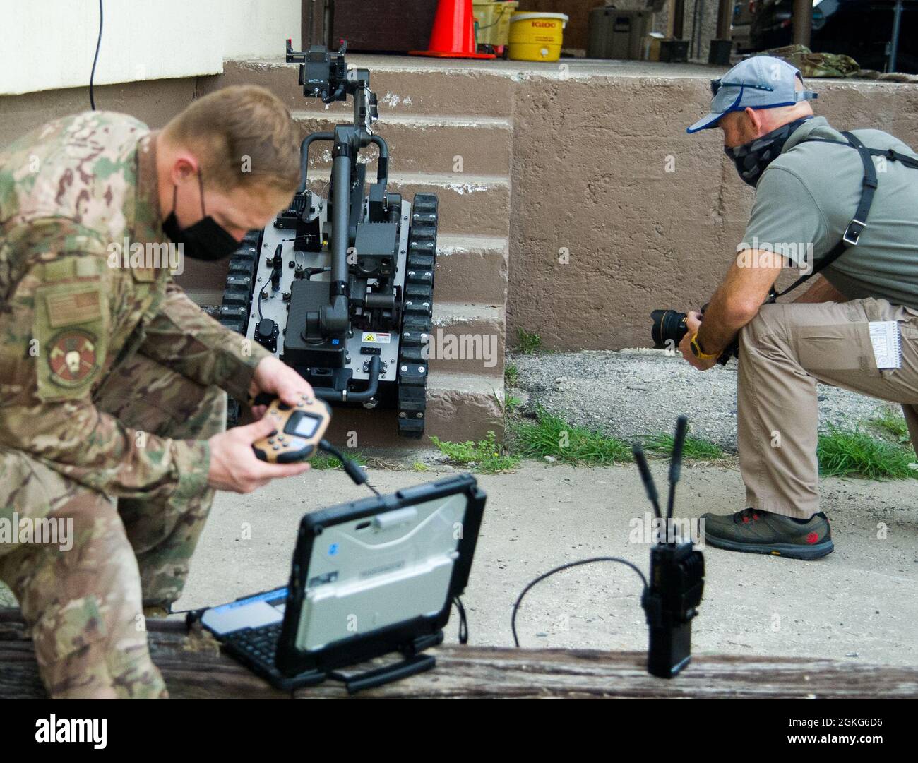 U.S. Air Force Senior Airman Shayne Mooney (left), 902nd Civil ...
