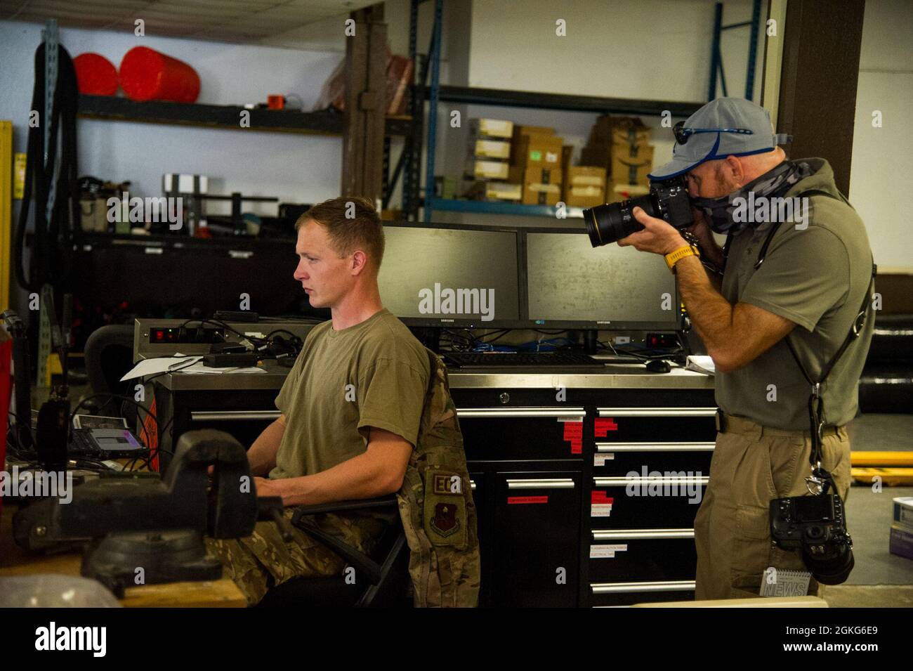 U.S. Air Force Senior Airman Shayne Mooney (left), 902nd Civil ...