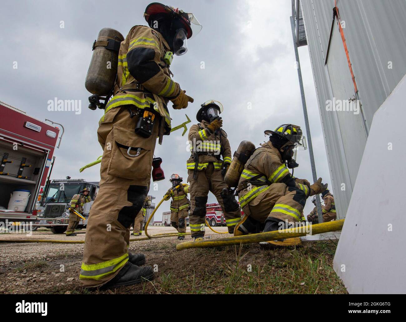 Firefighters from Cibolo Fire Department don gear before responding to ...