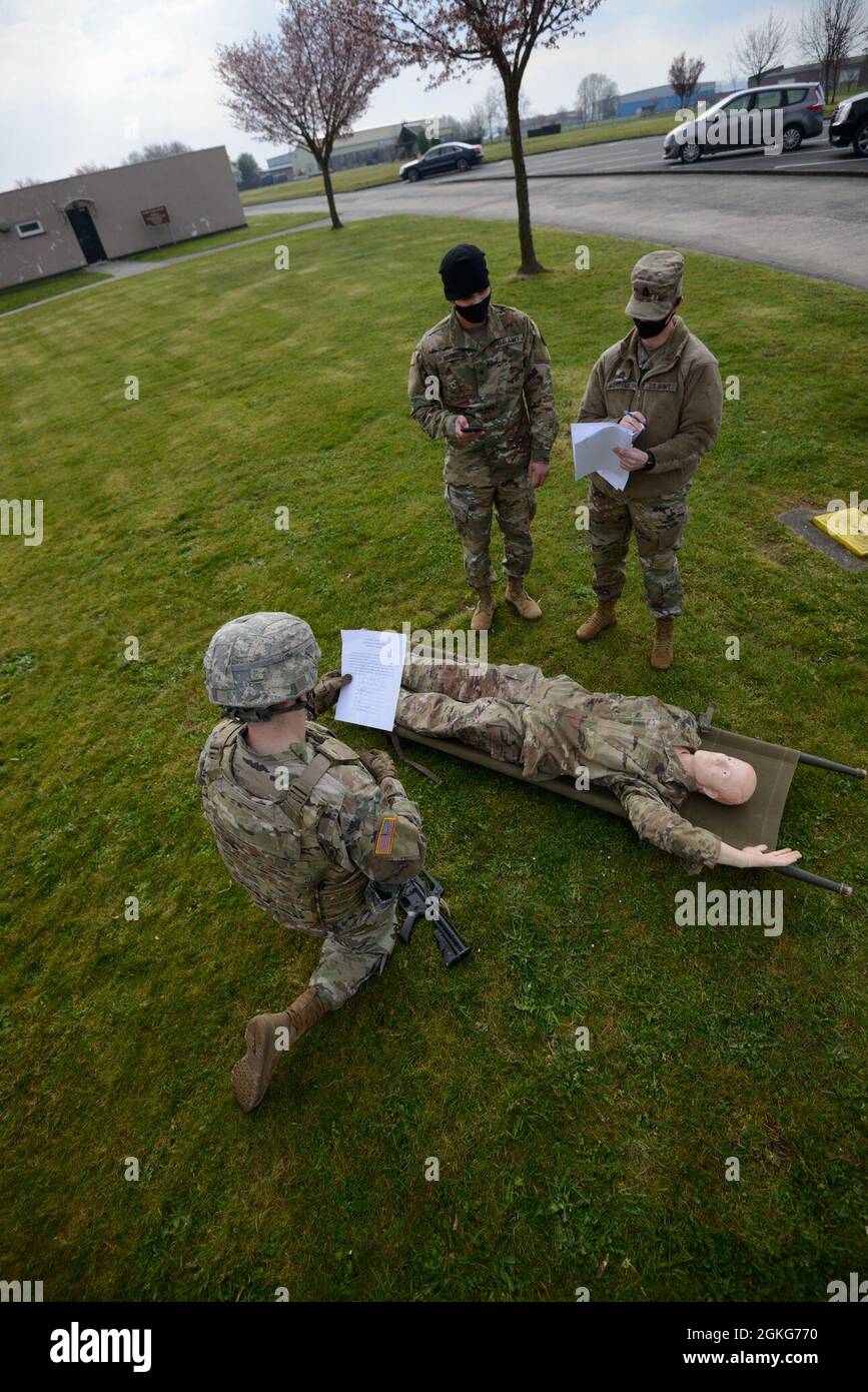 U.S. Army Spc. Jeremy Rivera (center), a Human Resources Specialist ...