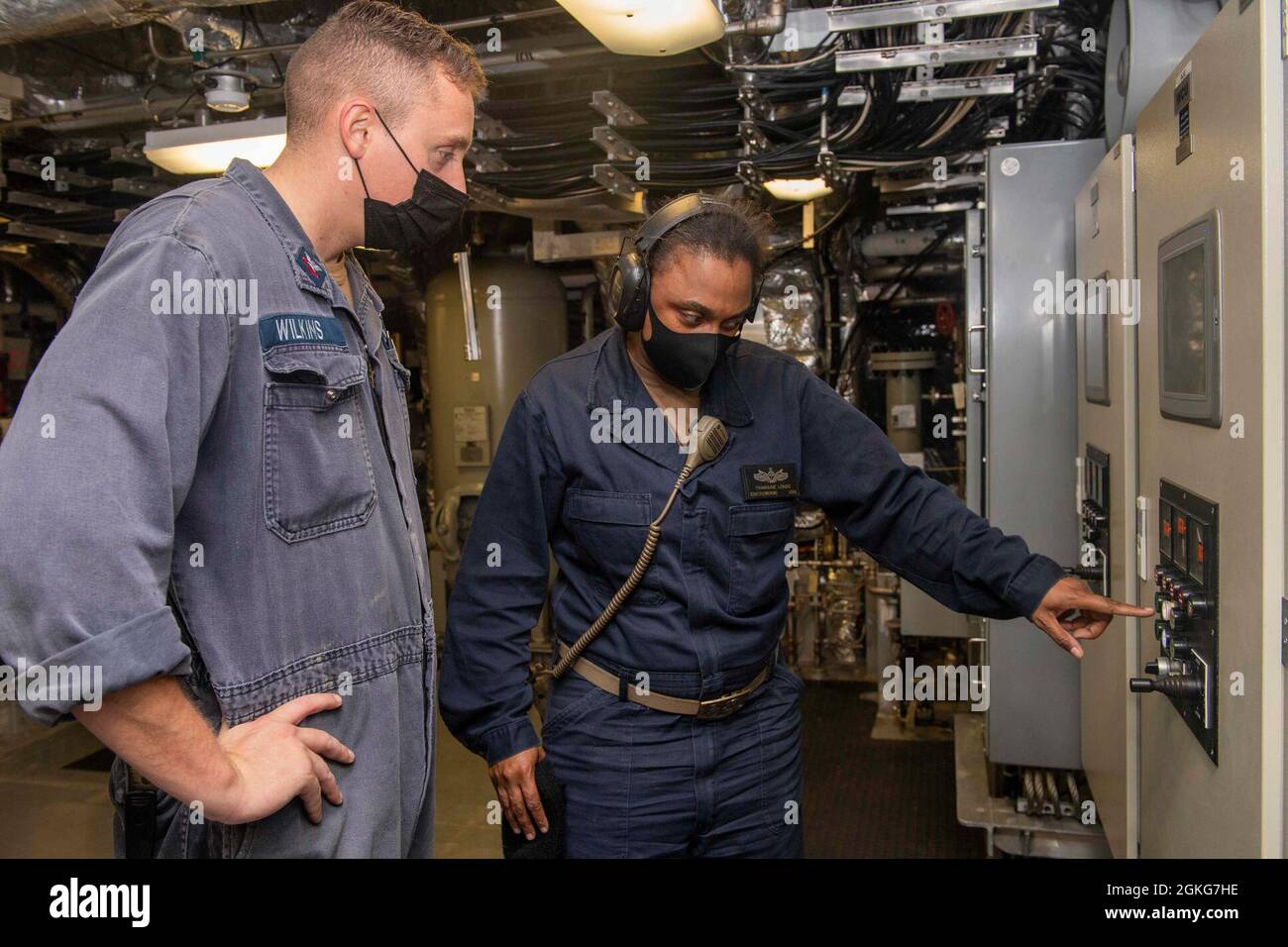 PACIFIC OCEAN (April 14, 2021) Engineman 1st Class Kyle Wilkins, left ...