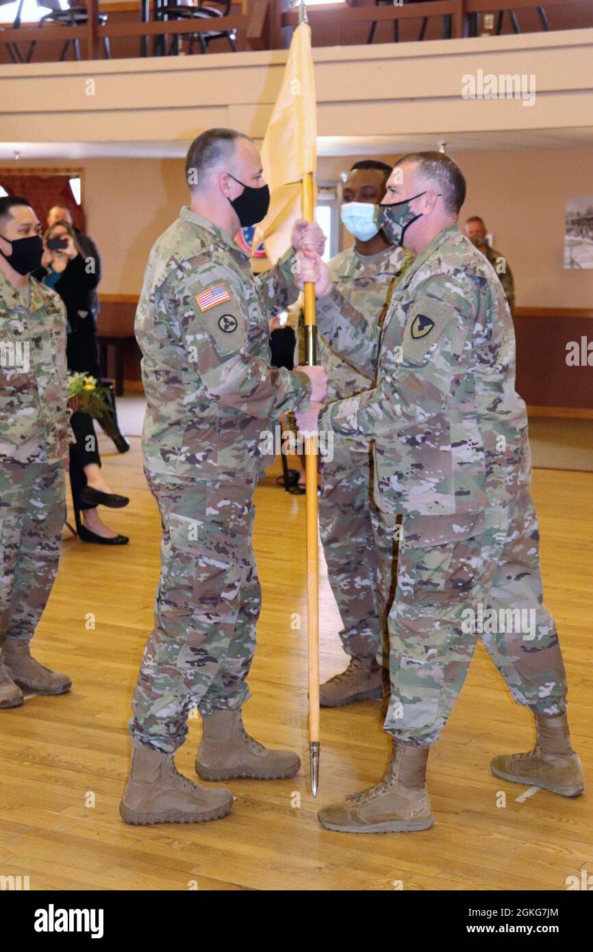 Maj. James Lavelle takes the flag for Headquarters and Headquarters ...