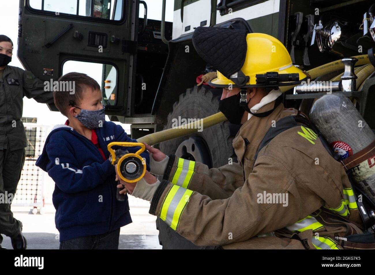 Children with fire and rescue hose hi-res stock photography and images ...
