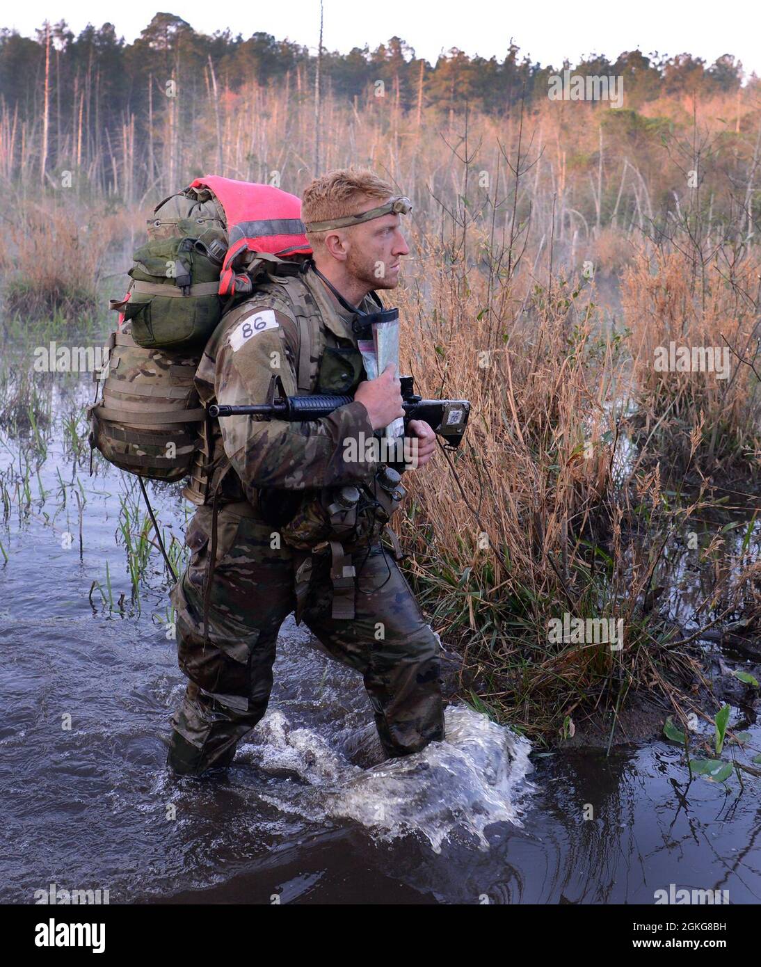 A Soldier from the U.S. Army John F. Kennedy Special Warfare Center and ...