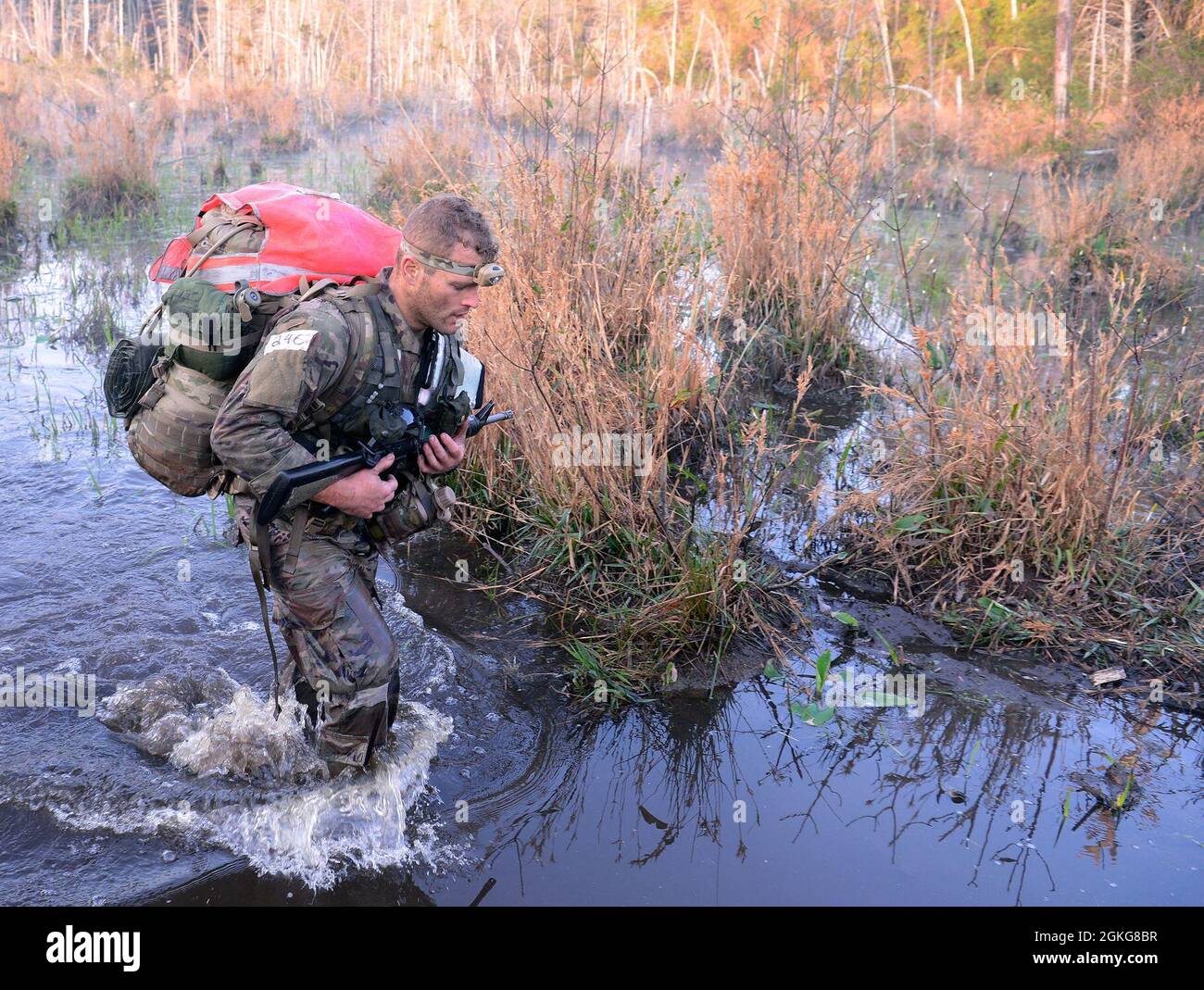 A Soldier from the U.S. Army John F. Kennedy Special Warfare Center and ...
