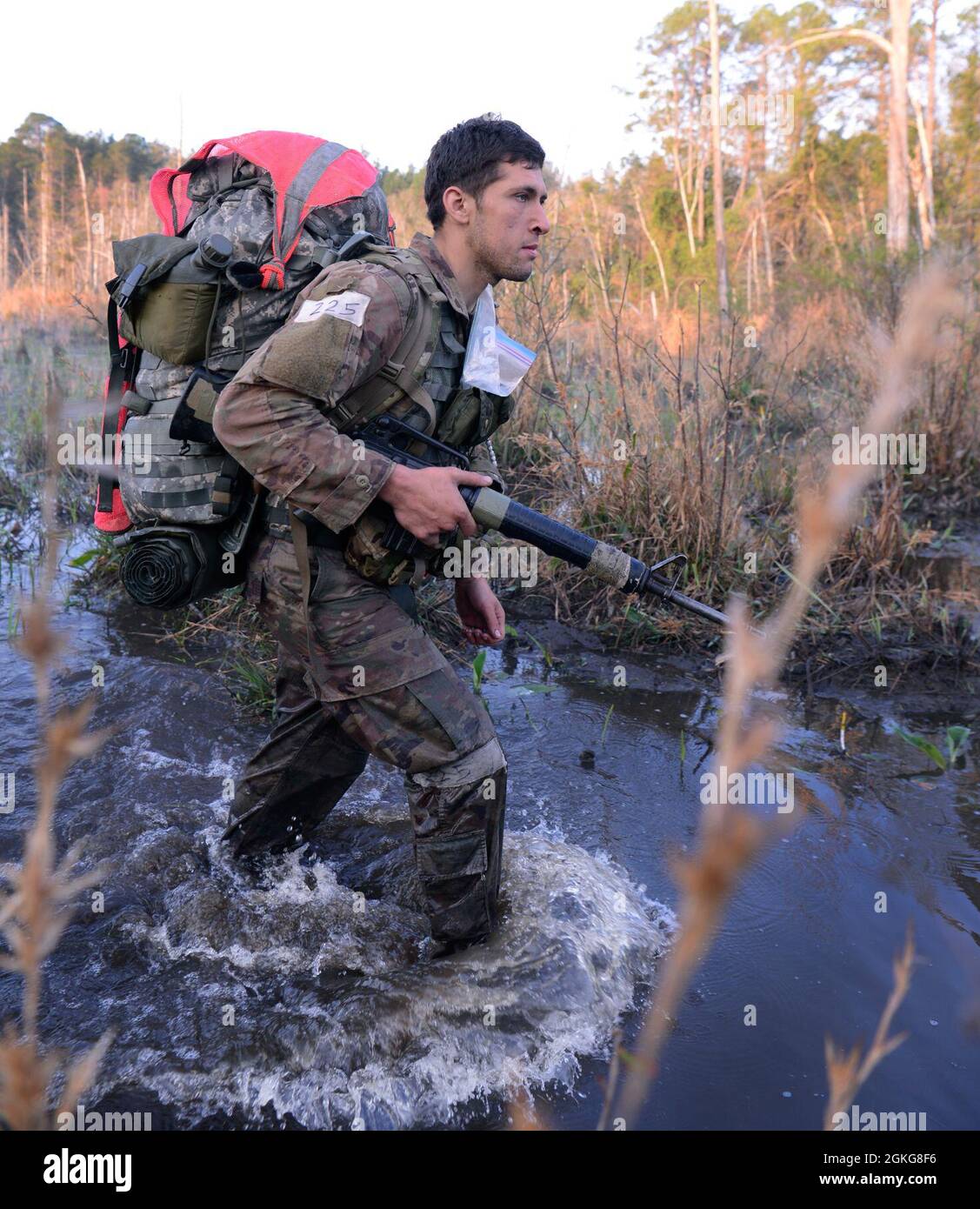 A Soldier from the U.S. Army John F. Kennedy Special Warfare Center and ...