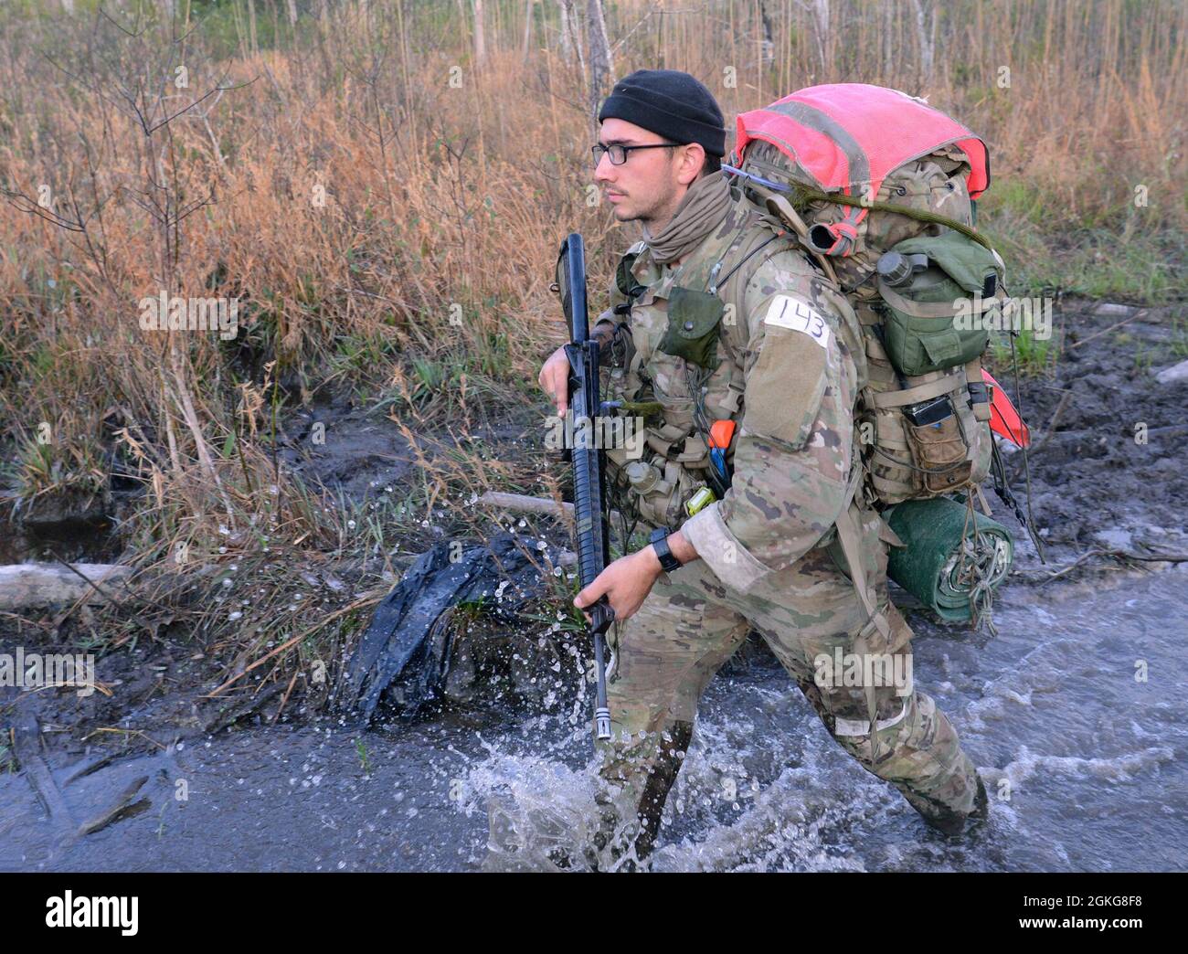 A Soldier from the U.S. Army John F. Kennedy Special Warfare Center and ...