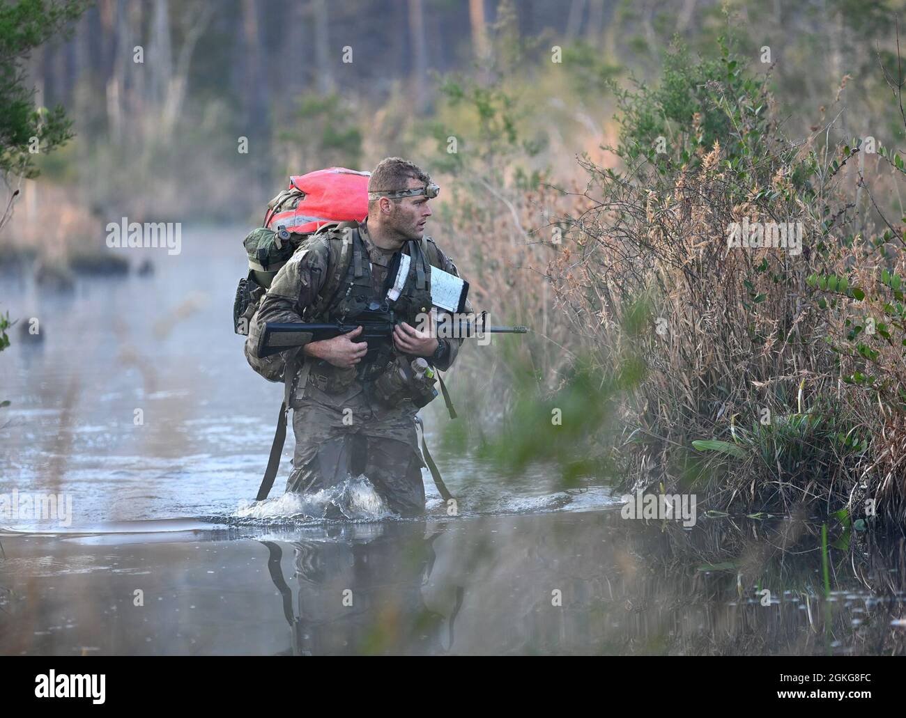 A Soldier from the U.S. Army John F. Kennedy Special Warfare Center and ...