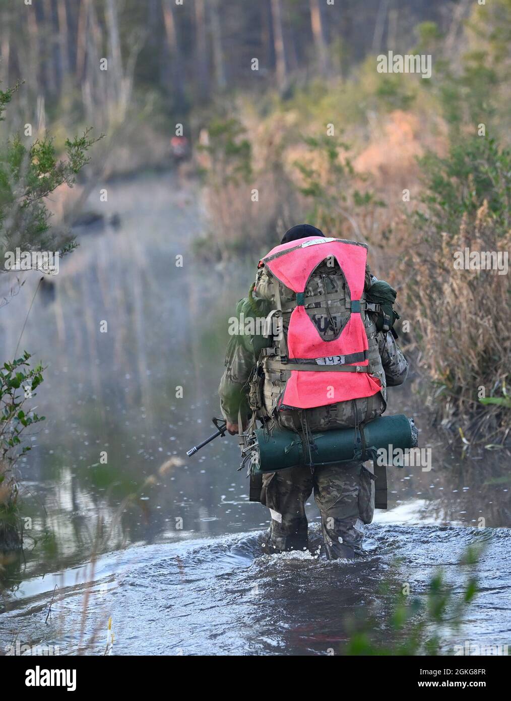 A Soldier from the U.S. Army John F. Kennedy Special Warfare Center and ...