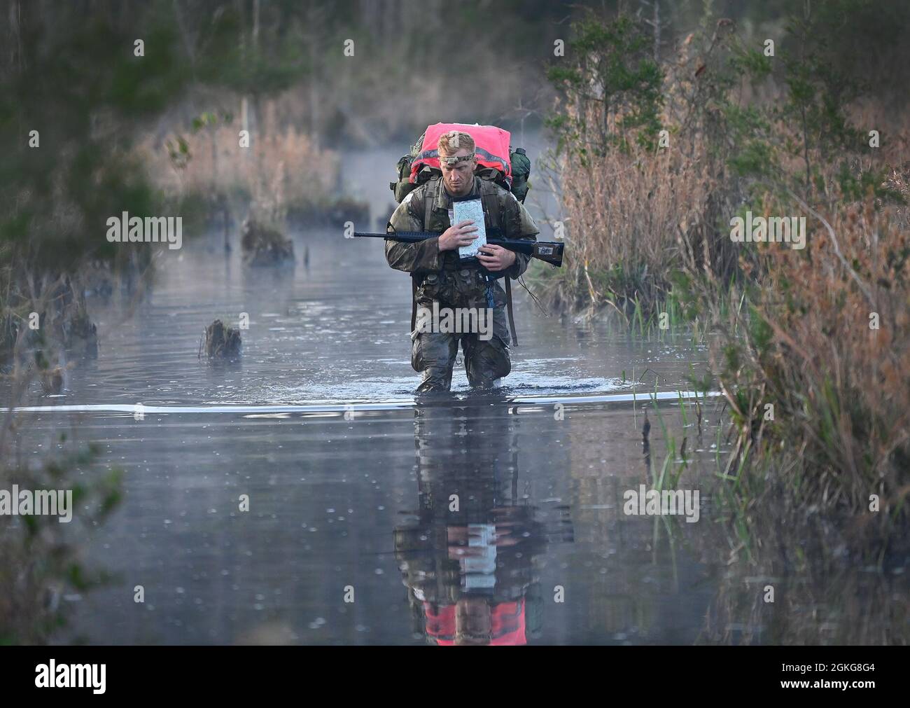 A Soldier from the U.S. Army John F. Kennedy Special Warfare Center and ...