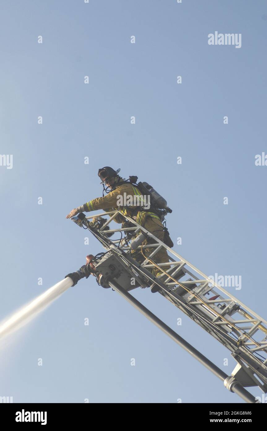 Aerial ladder firefighter hi-res stock photography and images - Alamy