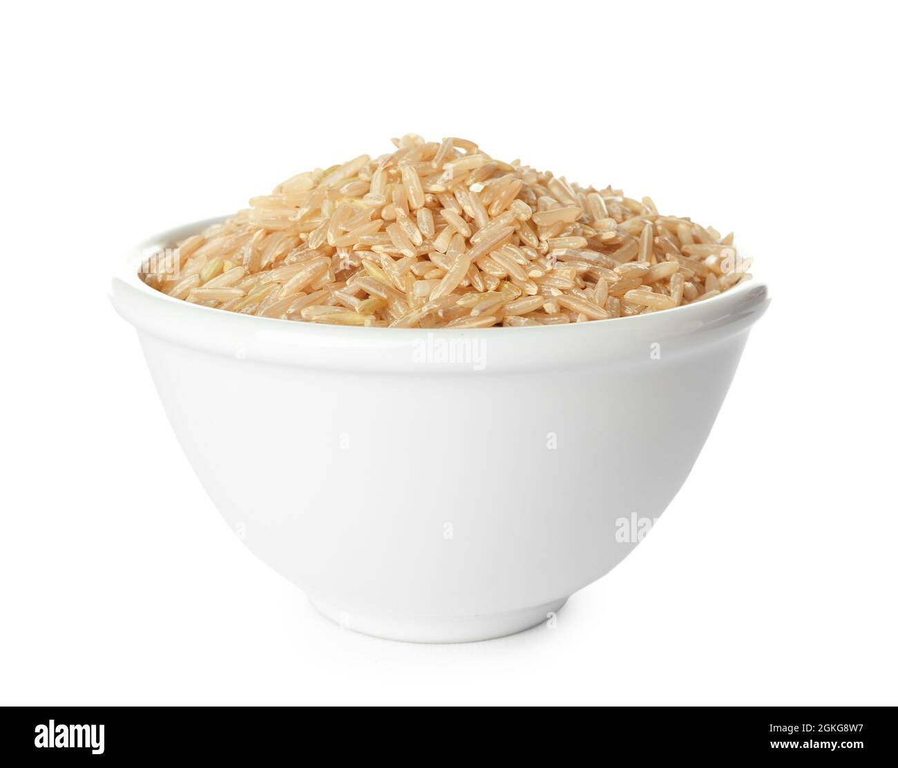 Bowl with brown rice on white background Stock Photo - Alamy