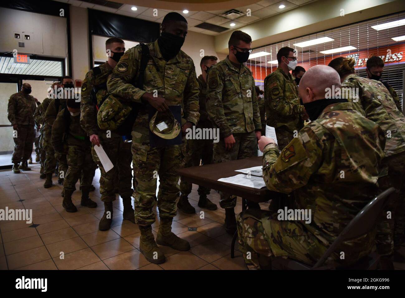 Airmen from the 8th Force Support Squadron practice accepting follow-on ...