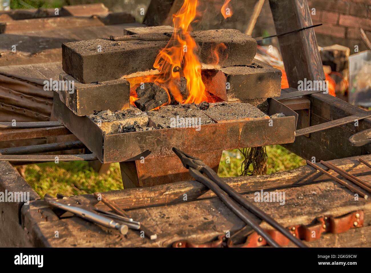 A burning fire in a forge for forging iron products Stock Photo - Alamy