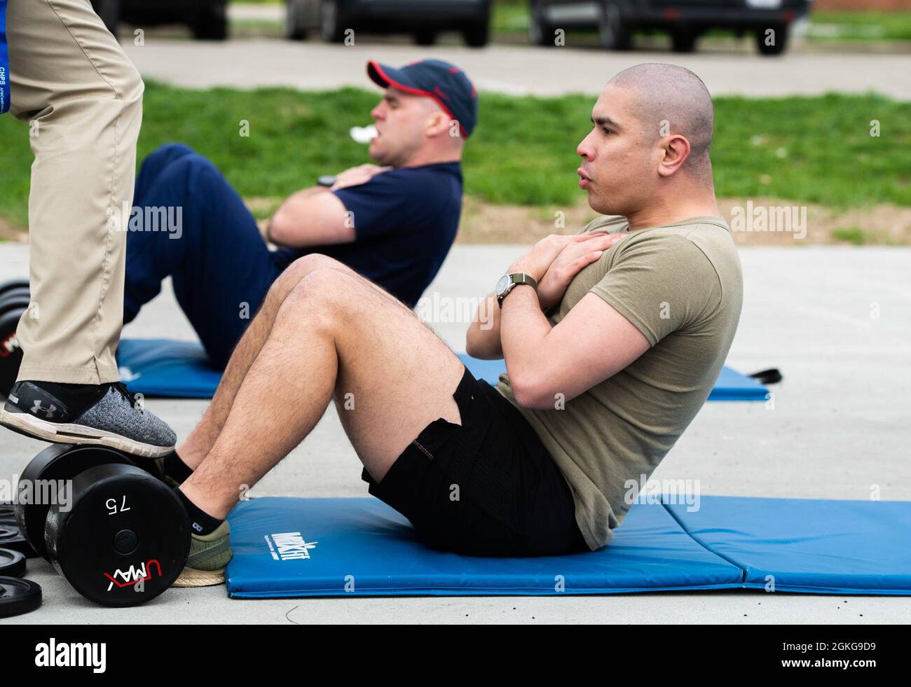 U.S. Air Force Airman 1st Class Michael Mannozzi, 88th Air Base Wing chaplain’s assistant, back ...