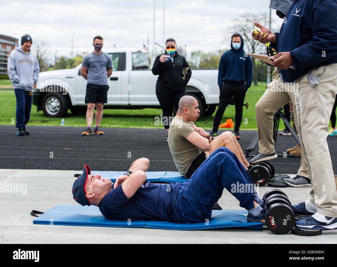 U.S. Air Force Airman 1st Class Michael Mannozzi, 88th Air Base Wing chaplain’s assistant, front ...