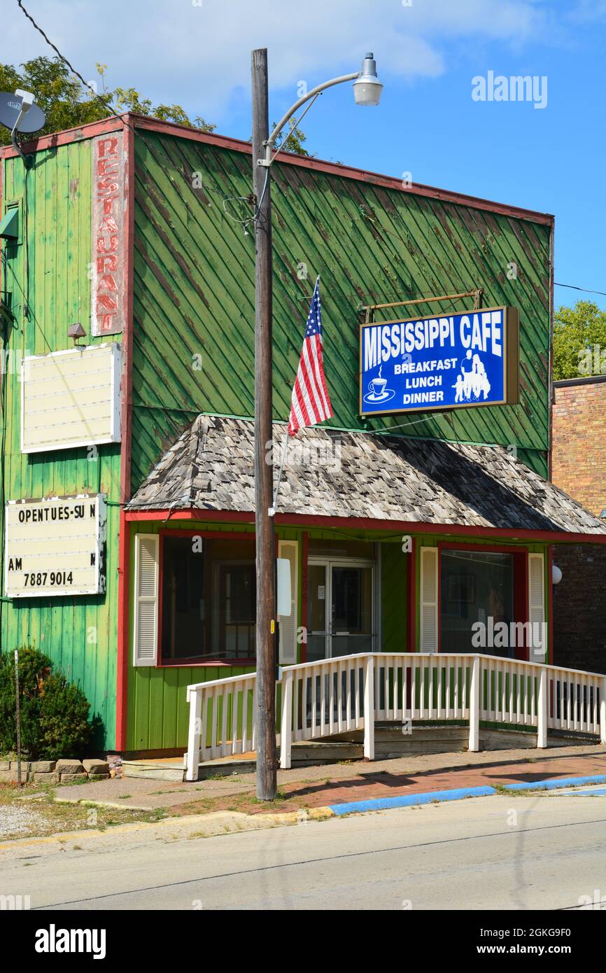 Colorful cafe storefront along the main street of the Mississippi River ...
