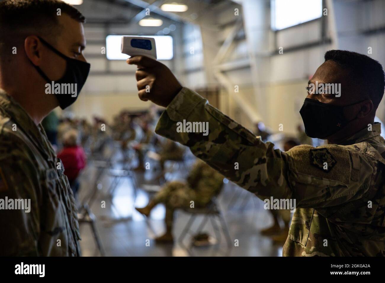 Staff Sgt. Kwayme Kennedy (right), senior geospatial engineer ...