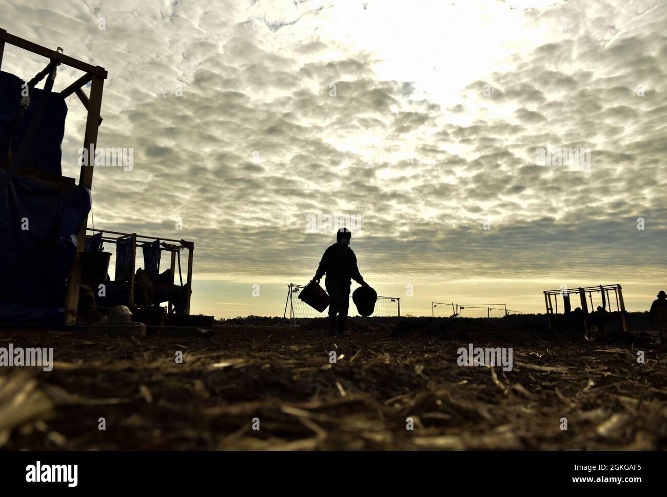 A member of a Defense POW/MIA Accounting Agency (DPAA) recovery team ...