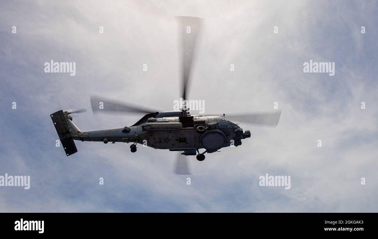 PACIFIC OCEAN (April 15, 2021) An MH-60R Sea Hawk, assigned to the ...