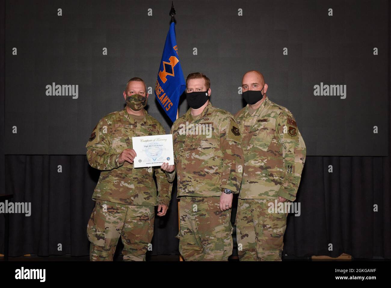 Tech. Sgt. Michael Brown, 607th Air Operations Center, accepts his ...