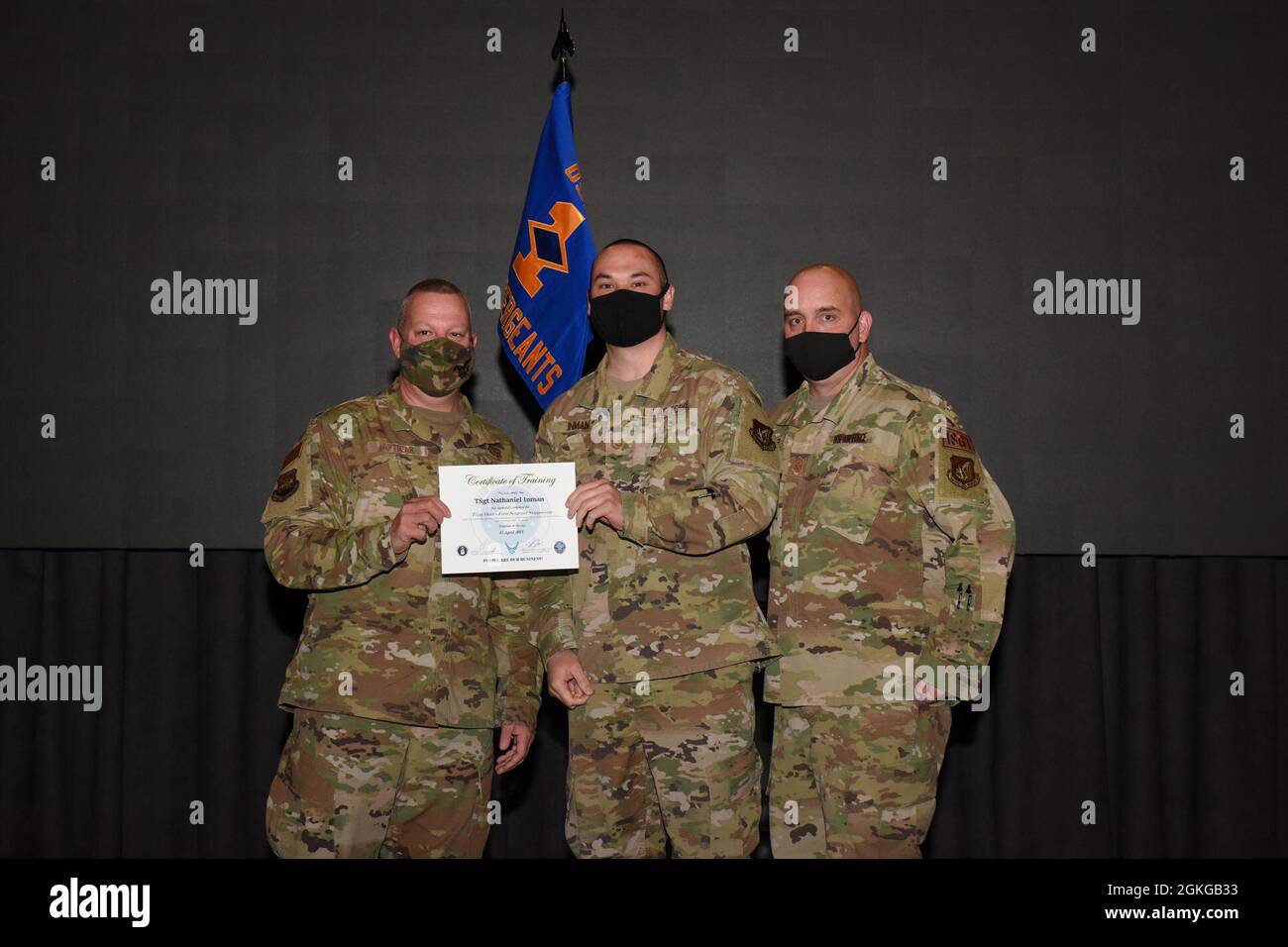 Tech. Sgt. Nathaniel Inman, 51st Civil Engineering Squadron, accepts ...