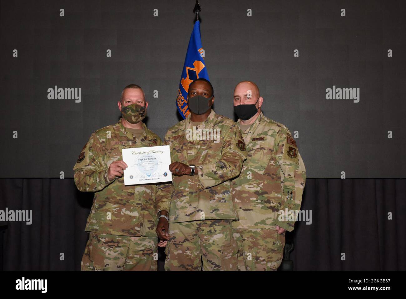 Tech. Sgt. Joe Perkins, 51st Security Forces Squadron, accepts his ...
