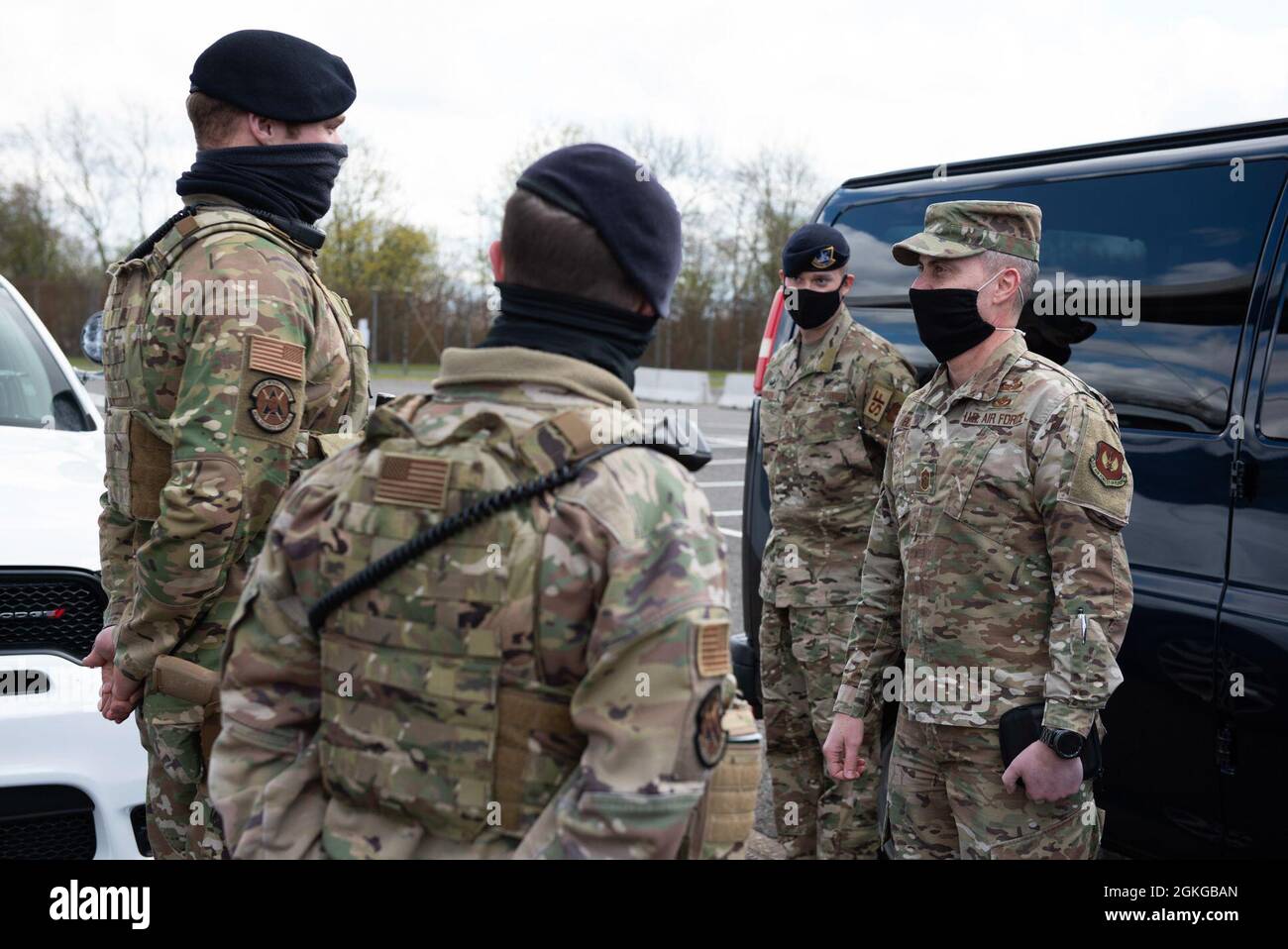 U.S. Air Force Airman 1st Class Colin Aristeguita, left, 423rd Security Forces Squadron ...