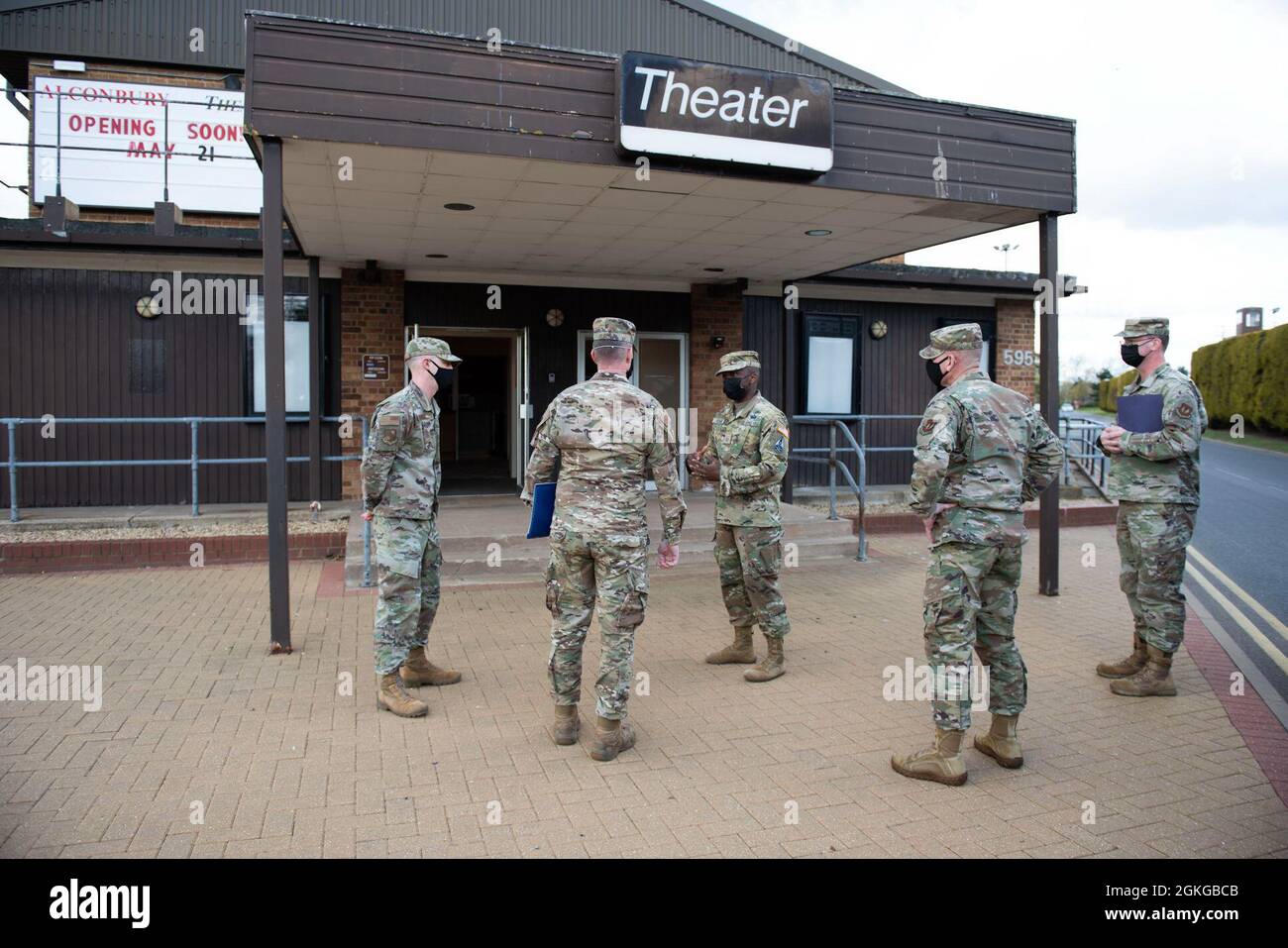 U.S. Space Force Master Sgt. Rajab Kigembe, center, 423rd Communications Squadron flight chief ...