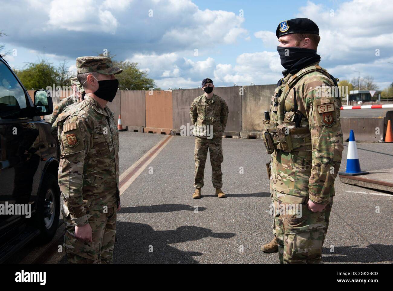 U.S. Air Force Airman 1st Class Colin Aristeguita, right, 423rd Security Forces Squadron ...