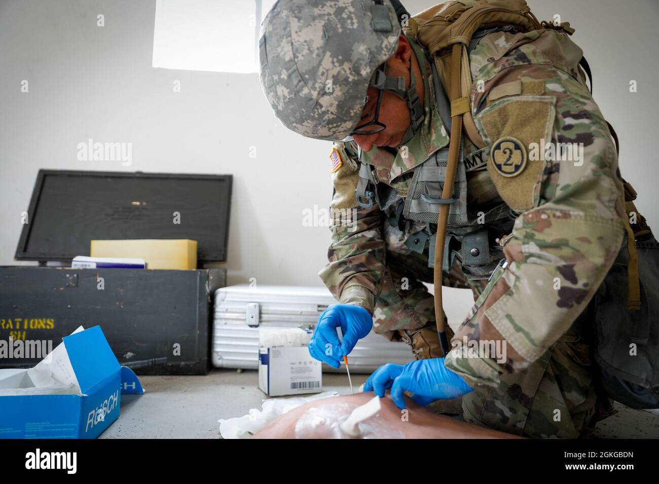 U.S. Army Cpl. Alberto Martinez from the 325th Field Hospital under the ...