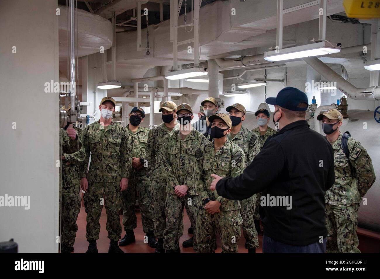 SASEBO, Japan (April 15, 2021) Ensign Timothy Garber, second from right ...