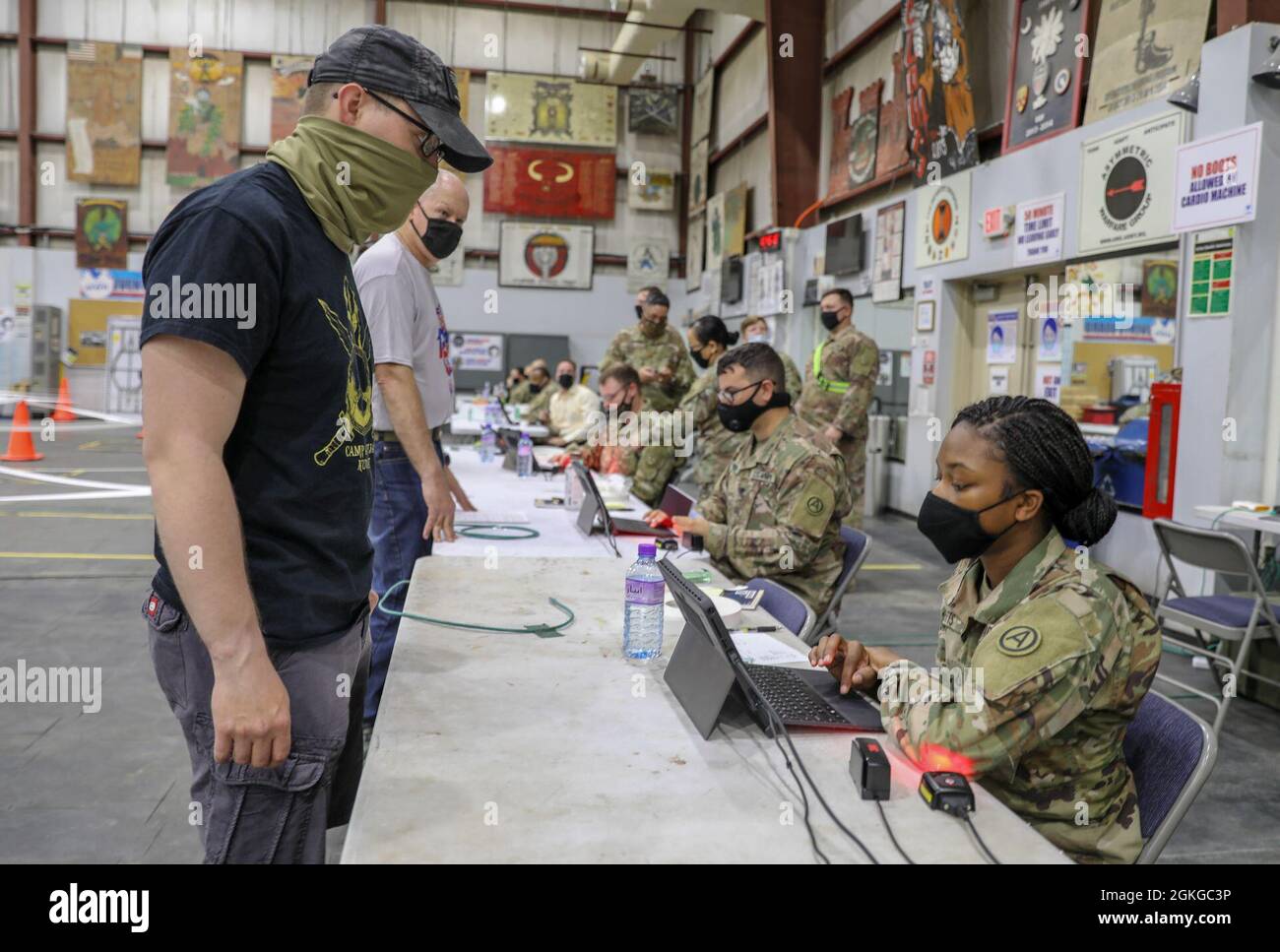Role players in-process at different stations during a Noncombatant ...