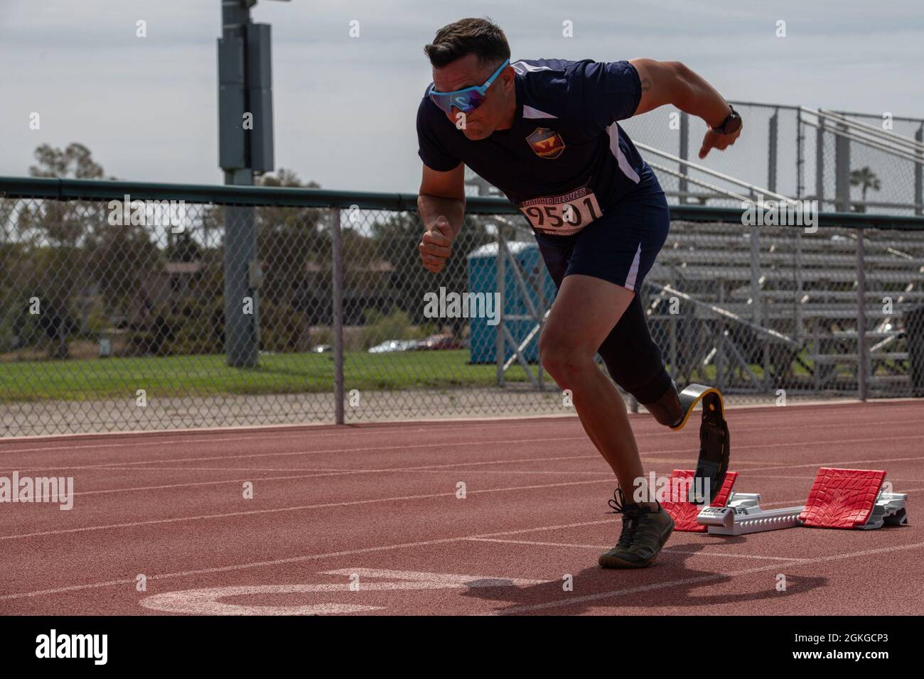 U.S. Marine Corps Capt. Thomas Benge competes in the track finals ...