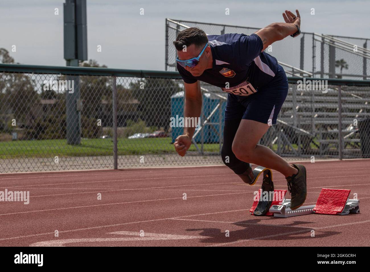 U.S. Marine Corps Capt. Thomas Benge competes in the track finals ...