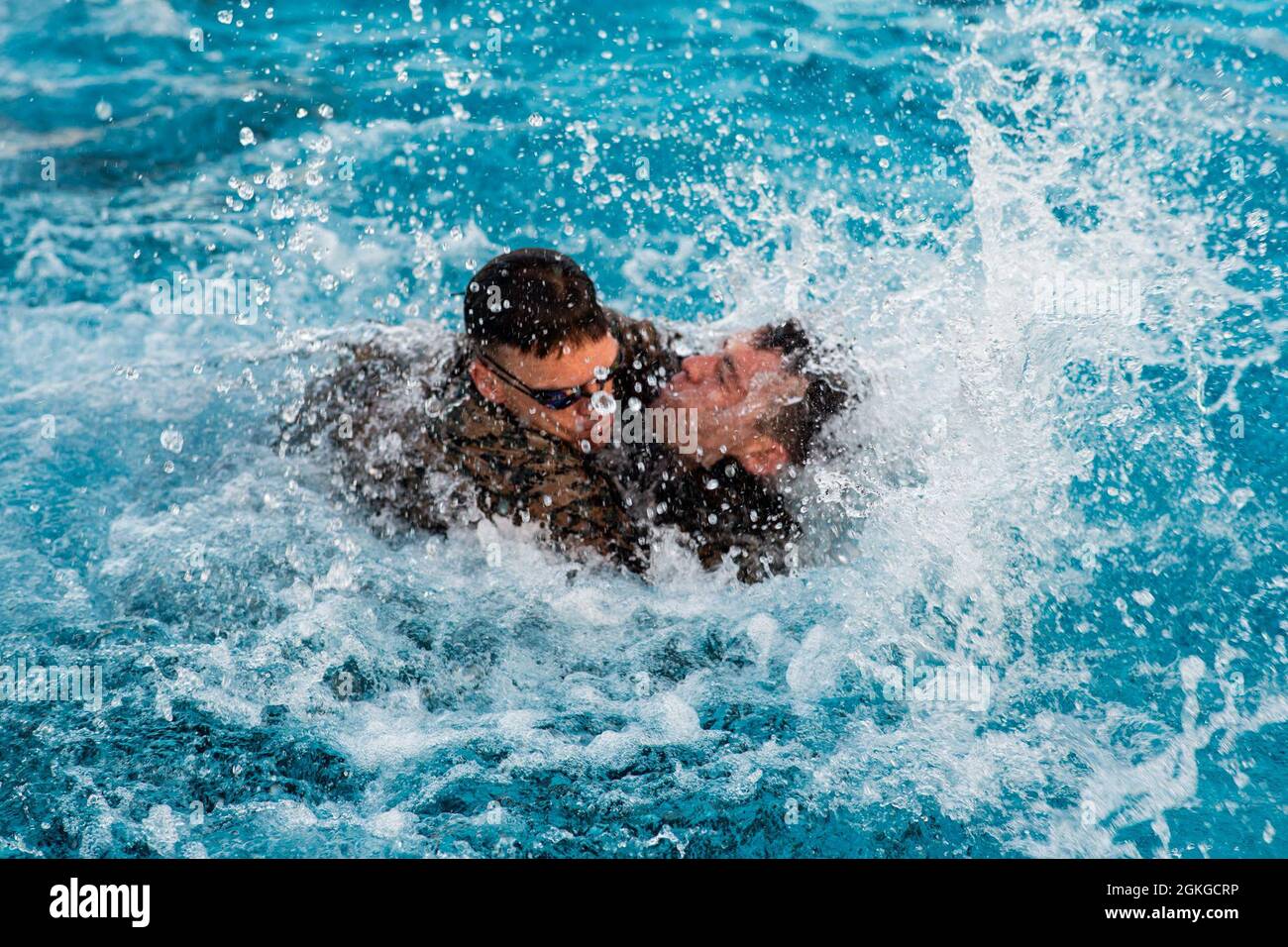 U.S. Marines conduct water survival sustainment training during the ...
