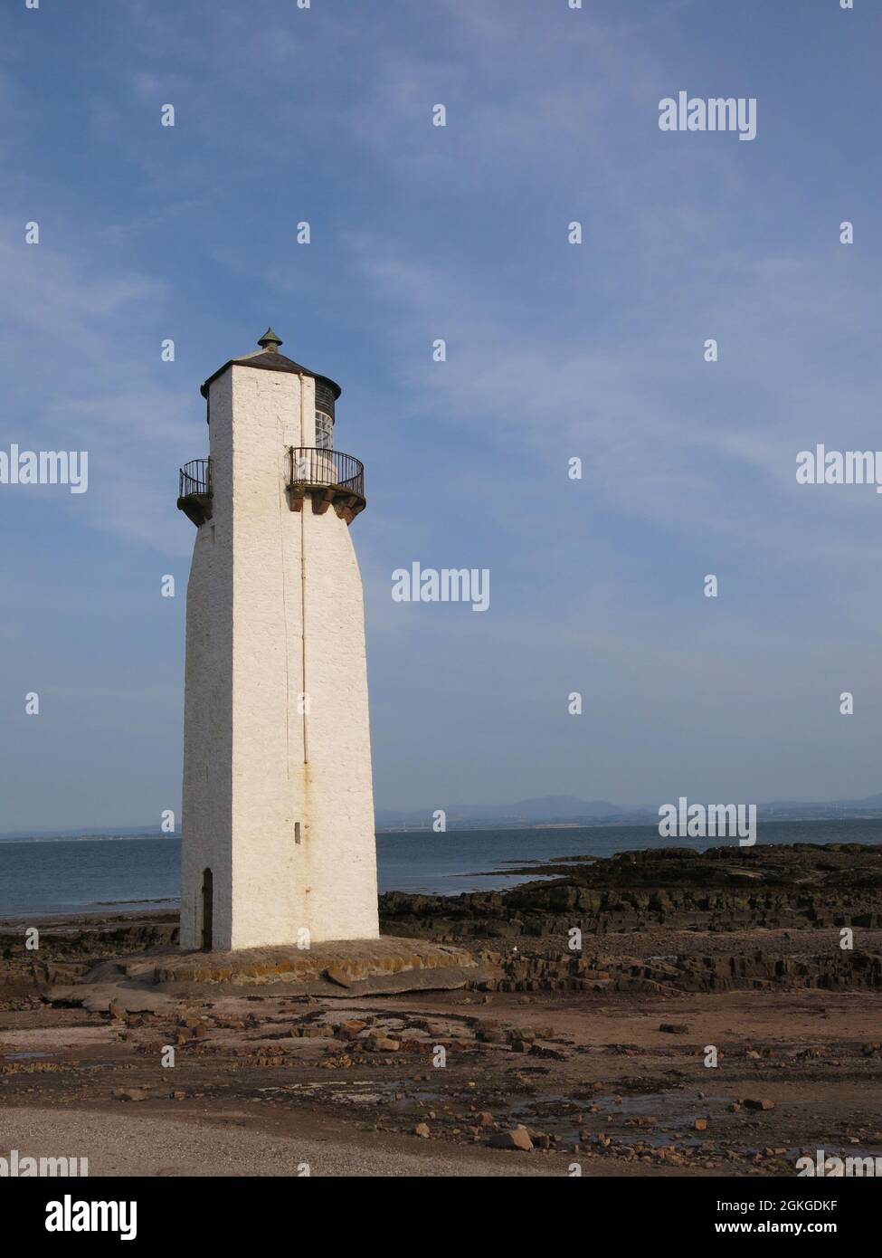 The tall, square, white tower on the Solway coastline is Southerness ...