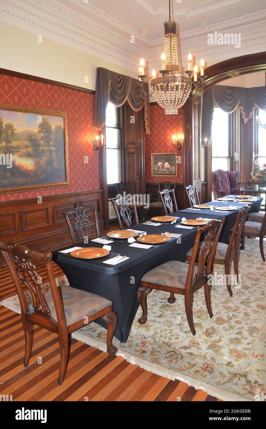 The dining room originally featured a massive walnut dining table able ...