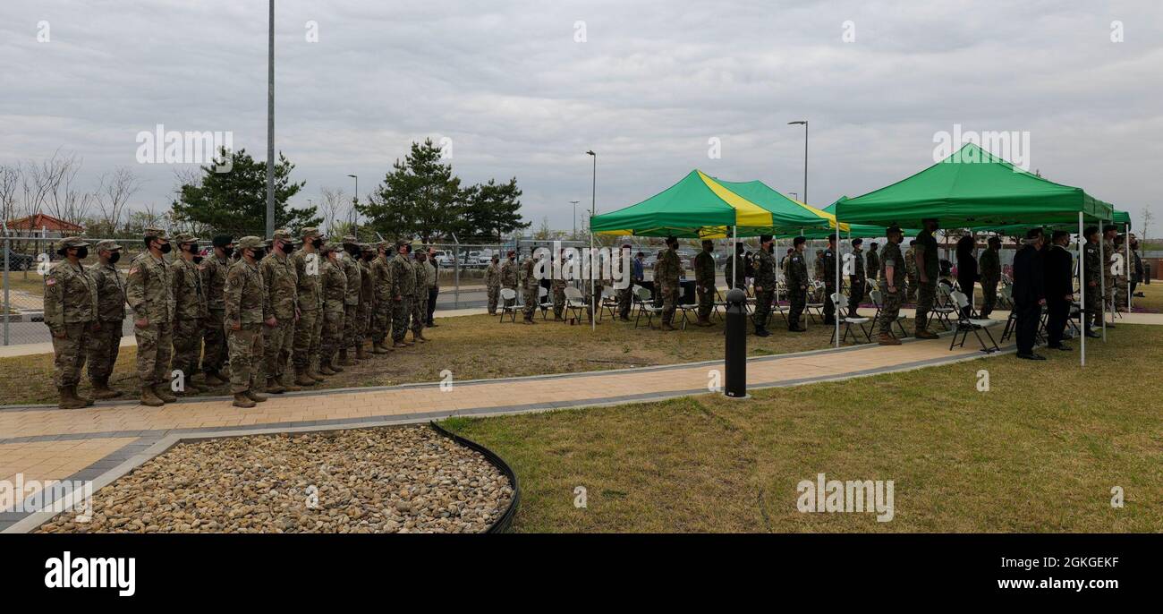 Special Operations Command Korea members and invited guests stand at ...