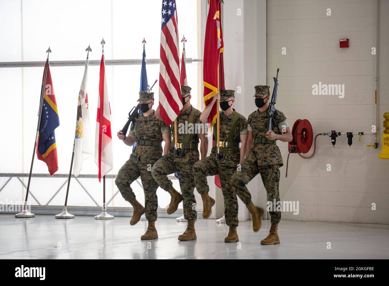U.S. Marine color guard march on the colors at the Marine Corps Air ...