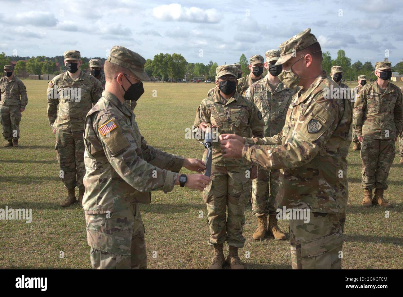Col. John Popiak, commander of the Army Cyber Protection Brigade (right ...