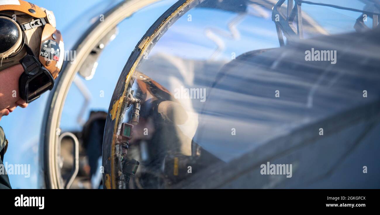 Marine Cpl. Hawes, a plane captain from Marine Attack Squadron 223 ...